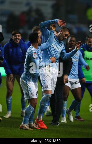 Queens Park Rangers fans celebrate their side's first goal of the game ...