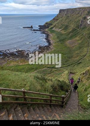 hiking along the Giants Causeway cliffs Stock Photo - Alamy