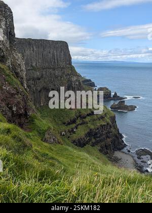 hiking along the Giants Causeway cliffs Stock Photo - Alamy