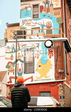 A cityscape with a vibrant Philly mural in the Manayunk neighborhood of ...