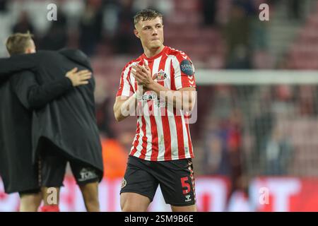 Daniel Ballard of Sunderland applauds the fans after the game during ...