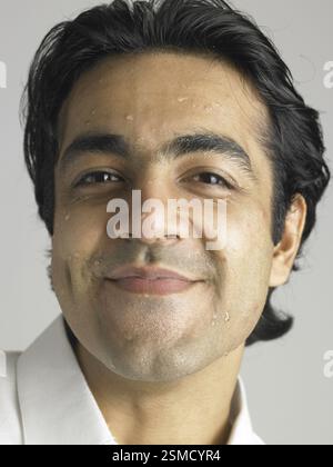 Sweat on face of Indian cricket player MR#702A Stock Photo - Alamy