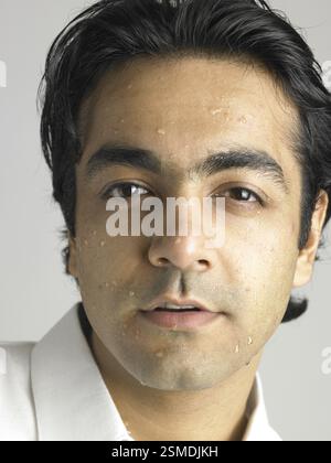 Sweat on face of Indian cricket player MR#702A Stock Photo - Alamy