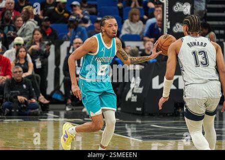 Charlotte Hornets guard Nick Smith Jr. (8) looks to pass the ball ...