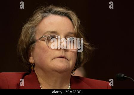 Abigail Slater, nominee to be an assistant attorney general, looks on ...