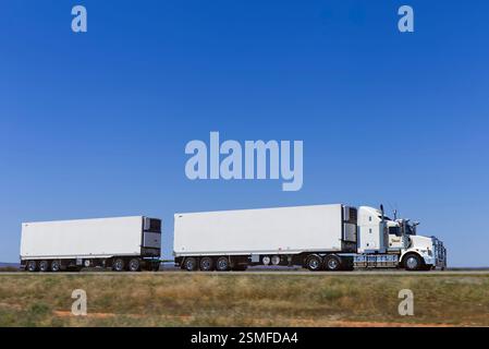 Long nose B Double semi trailer carrying goats headed for the livestock ...