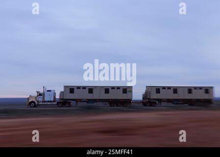 Portable Building - Donga being tranported by Roadtrain travelling the ...