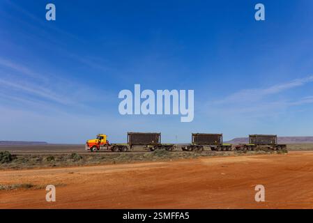 Side view of Triple B Road Train travelling the Stuart Highway South ...