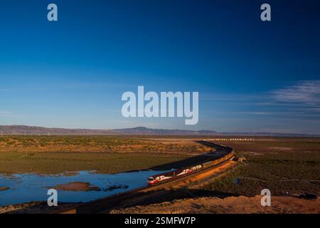 Aerial of Double Stacked Intermodal container freight train passing ...