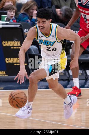 Indiana Pacers guard Ben Sheppard (26) shoots while defended by Denver ...