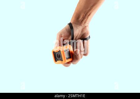 Male hand holding an action camera isolated on white background Stock ...