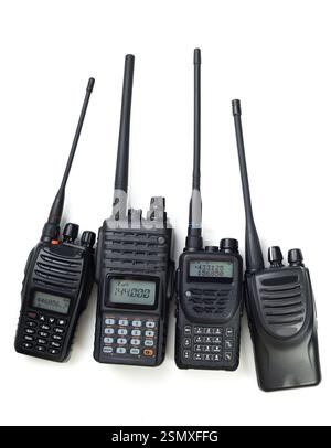 Different types of two-way radios lined up for communication and ...