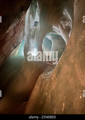A peek into an ice cave of Austrian alps Stock Photo - Alamy