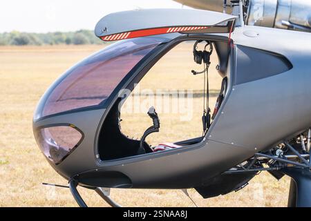 Modern two-seater small helicopter cockpit Stock Photo - Alamy