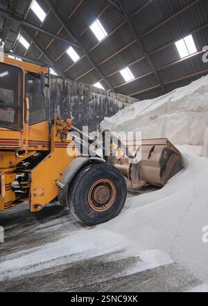 Shovel working at a distribution and storage centre for fertilizers ...