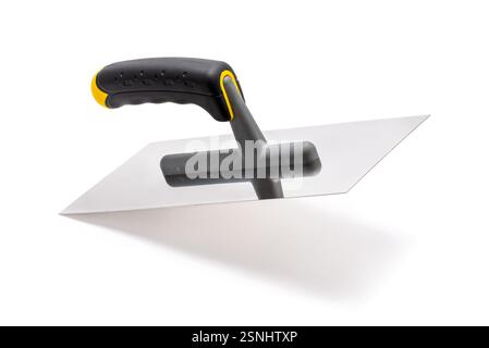 Trowel with black-yellow handle to the smoothing of plaster isolated on ...
