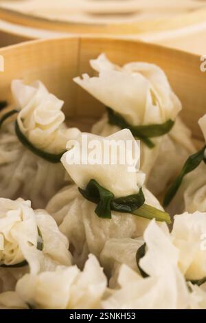 Dumplings in bamboo steamers Stock Photo - Alamy