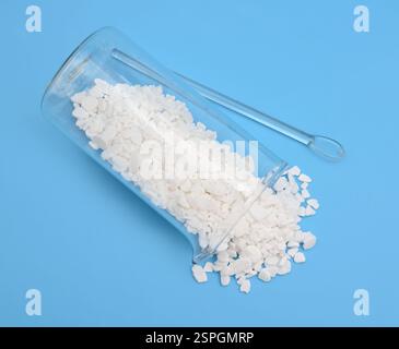 Calcium chloride on blue background Stock Photo - Alamy