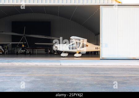 Small light helicopter Auto Gyro in yellow color on the ground. Super ...