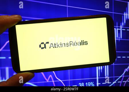 In this photo illustration, the AtkinsRealis Group Inc company logo is ...
