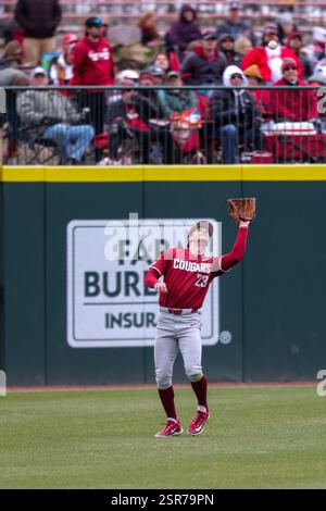 Washington State outfielder Max Hartman (23) celebrates his scoring run ...