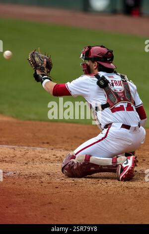 Arkansas catcher Ryder Helfrick (27) makes a play to first base against ...