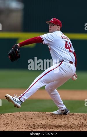 February 14, 2025: Razorback pitcher Zach Root (33) looks into the ...