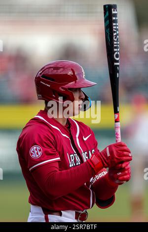 February 25, 2025: Arkansas hitter Charles Davalan (24) begins his ...