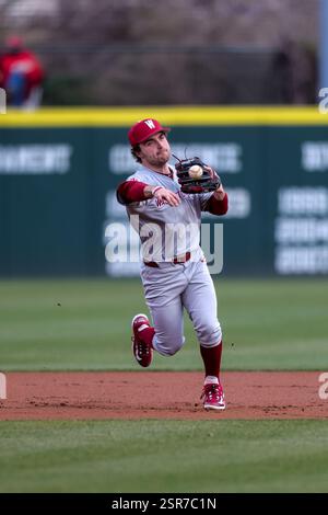 February 14, 2025: Cougars infielder Ollie Obenour (8) settles in front ...