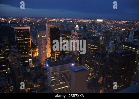A breathtaking view of a glowing, starry sky at night with silhouettes ...