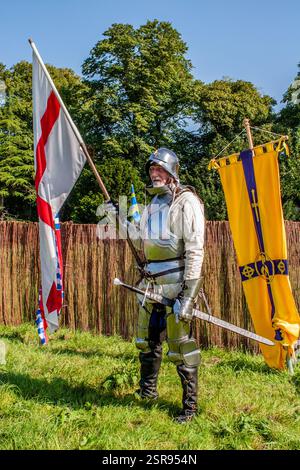 Historical re-enactment and medieval fayre with knight in armour ...