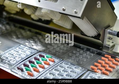 Capsule medicine pills during production line and packing process on ...
