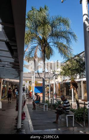 Shaded pedestrian mall corridor inside Rua dos Biquinis mall in Gamboa ...