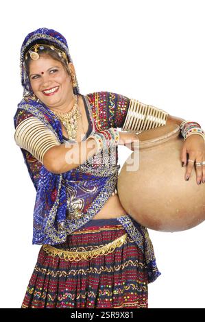 Rajasthani lady carrying earthen pitcher in hands MR#786 Stock Photo ...
