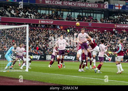 Nathan Collins of Brentford (c) heads the ball and scores his teams 2nd ...