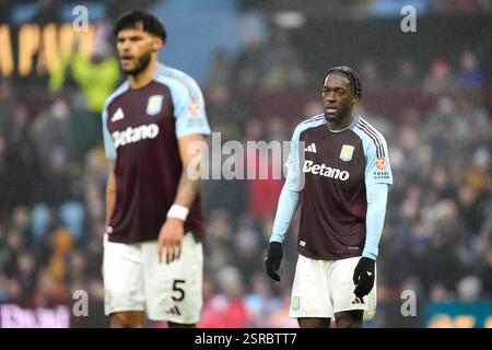 Aston Villa's Axel Disasi (right) tackles Brentford's Kevin Schade ...