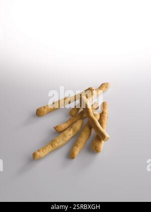 Snacks, Bread sticks biscuits on white background Stock Photo - Alamy