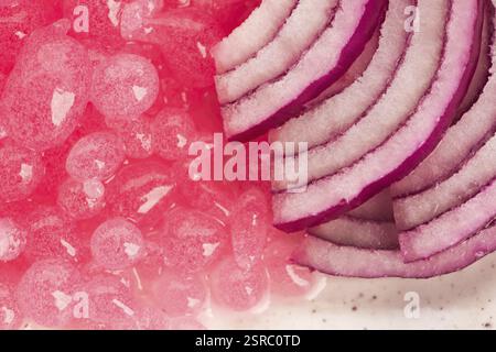 Molecular onion caviar balls on ceramics plate Stock Photo - Alamy