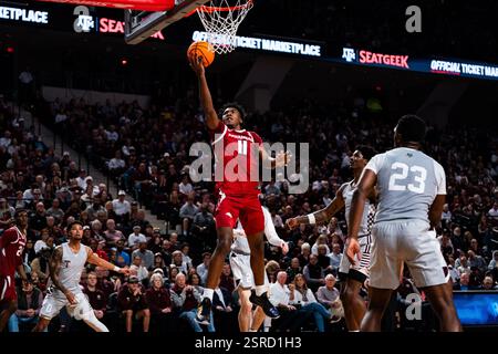 Arkansas forward Karter Knox (11) goes to the basket between Auburn ...
