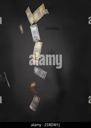 Indian currency notes floating in air Stock Photo - Alamy