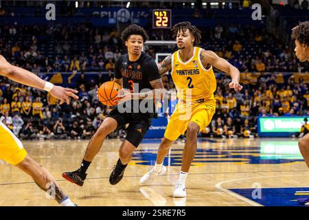 Miami guard Jalil Bethea (3) drives to the basket as Duke center Khaman ...
