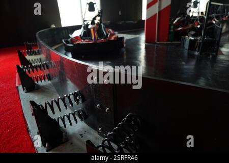 Details of modern indoor go kart racing track Stock Photo - Alamy