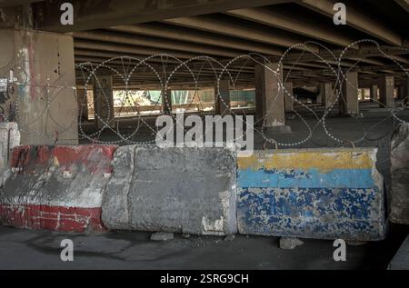 The road blocks and barbed wire on the streets of Beirut, during the ...
