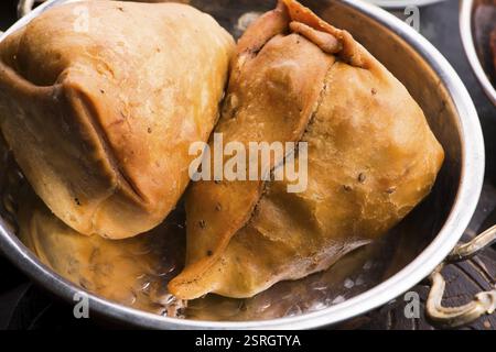 Veg Samosa - is a crispy and spicy Indian triangle shape snack Stock ...