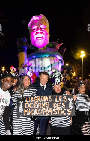 Christian Estrosi, mayor of Nice, poses with the giant figure of Paul ...