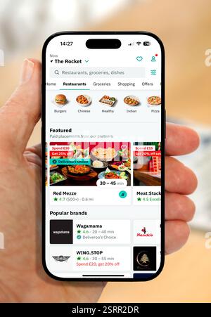 The Deliveroo app on an iPhone 16 Plus Stock Photo - Alamy