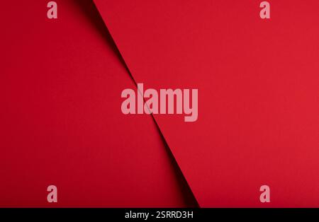 Bold scarlet red paper background with a deep matte texture and ...