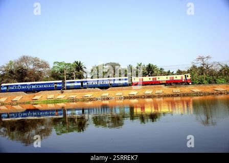 Mail train electric engine reflection in pond, Calcutta Kolkata, West ...