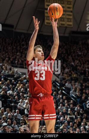 Wisconsin guard Jack Janicki (33) reacts after a basket against Purdue ...