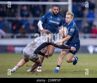 Newcastle Falcon's Ben Stevenson, is tackled during the Premiership Cup ...